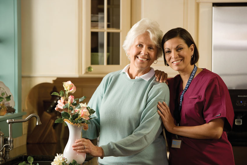 Woman with Caregiver | Caregiving Experts